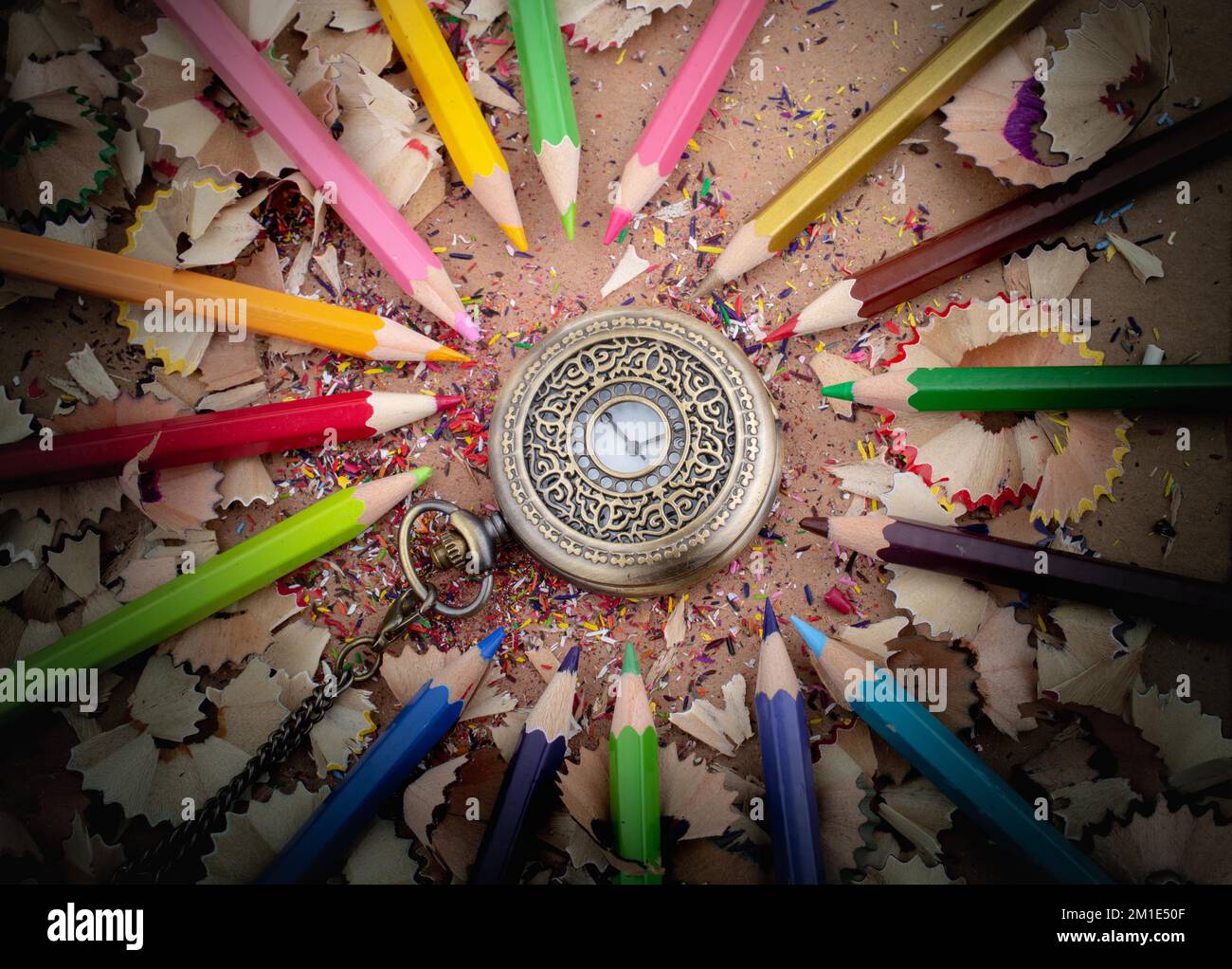 Mechanical pocket watch on pencil and shavings Stock Photo - Alamy