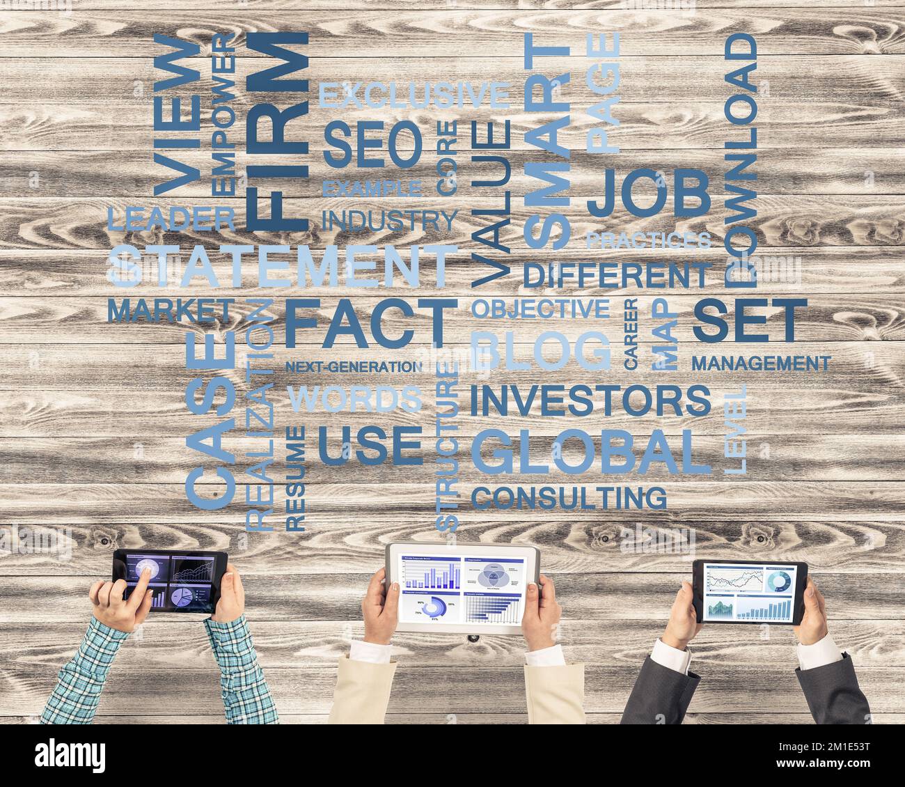 Top view of businesspeople sitting at table and using gadgets Stock ...