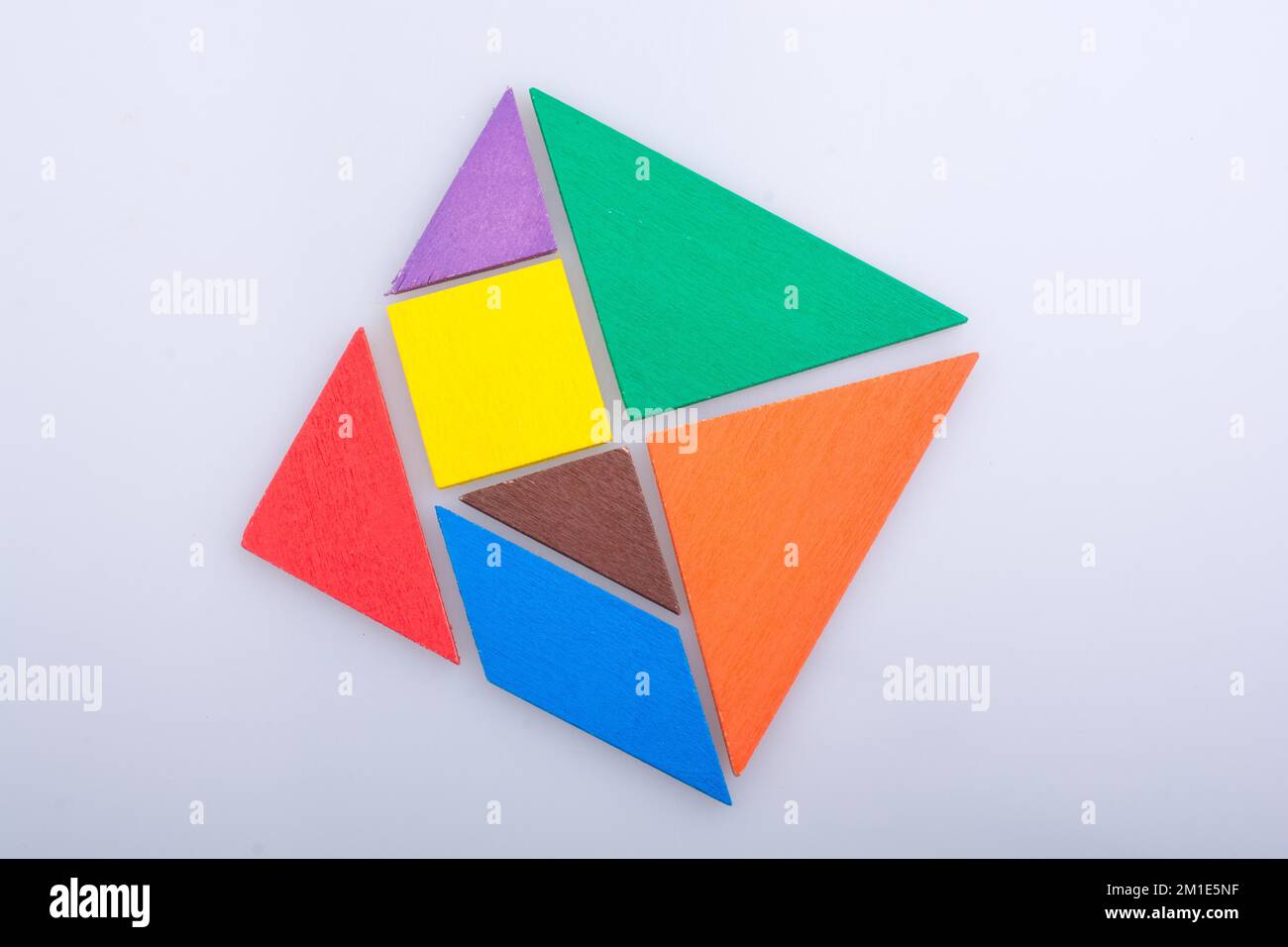 Colorful pieces of a square tangram puzzle Stock Photo - Alamy
