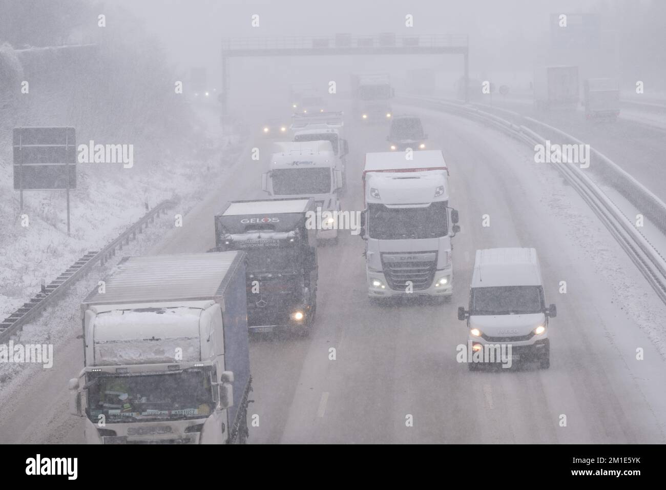 Dresden, Germany. 12th Dec, 2022. Cars and trucks are driving in heavy ...