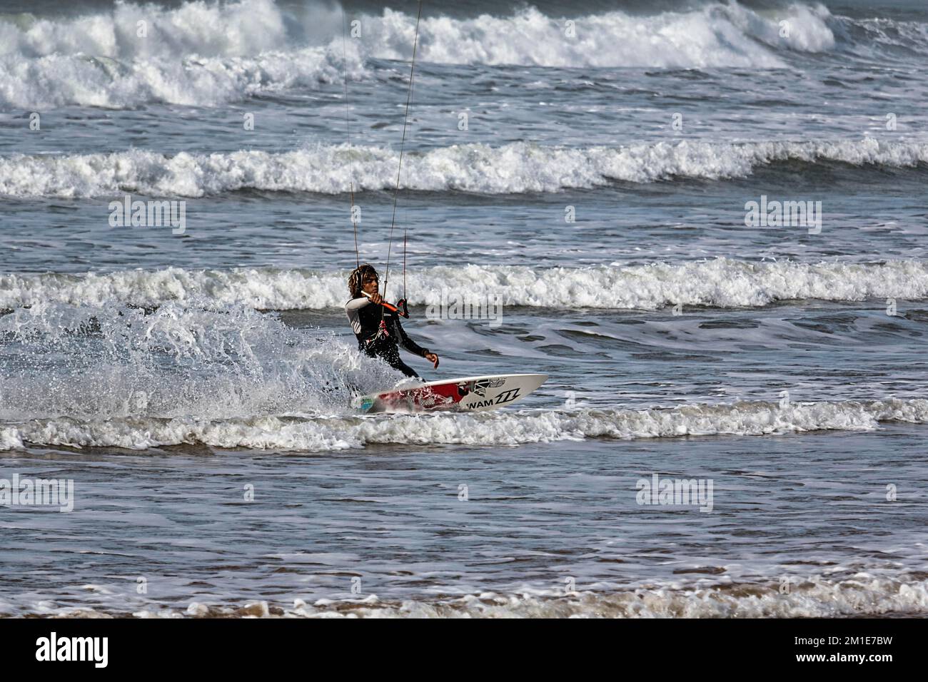 Kitesurfer, tourist in the waves, Plage Tagharte, Essaouira, Atlantic ...