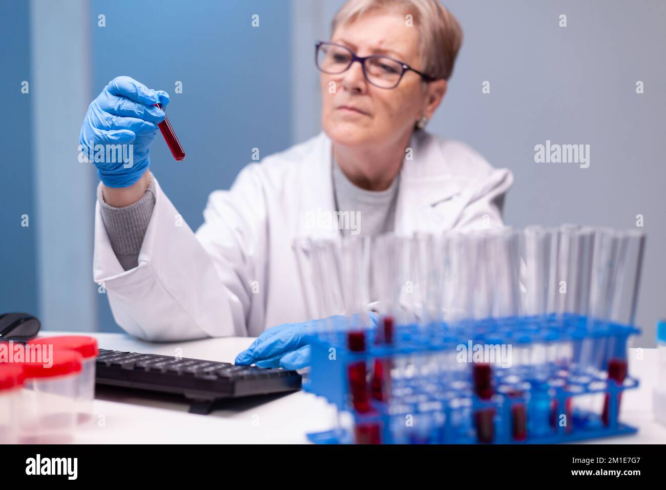 Biochemist scientist in white coat discovering genetic infection and ...