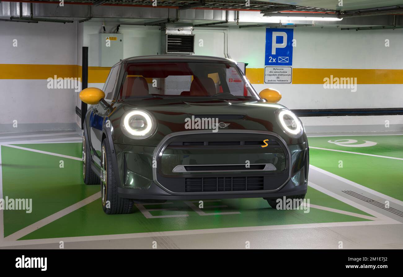 Mini Cooper SE Electric at charging point in underground parking lot ...
