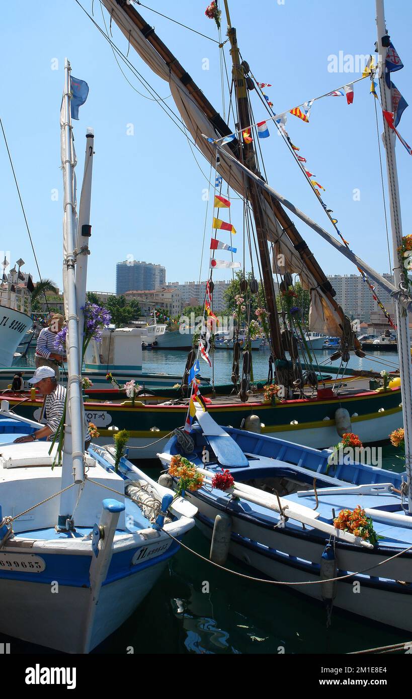 Fishing boat decorated with flowers for St. Peter's Day, patron saint ...