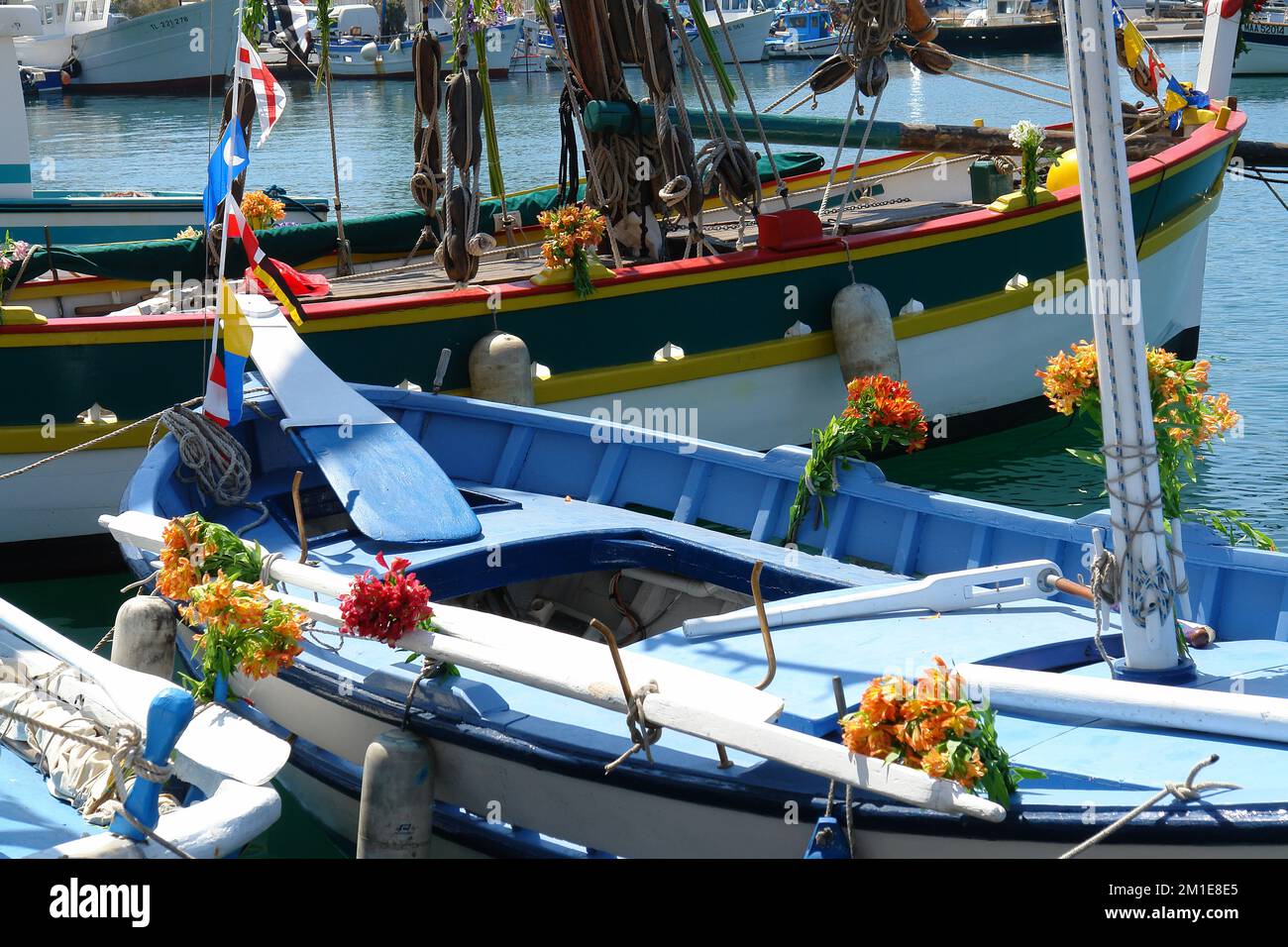 Fishing boat decorated with flowers for St. Peter's Day, patron saint ...