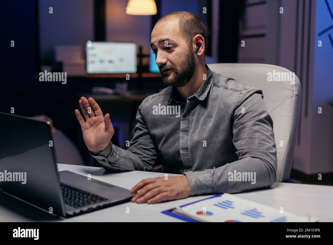 Entrepreneur greeting people during online call to talk about future ...