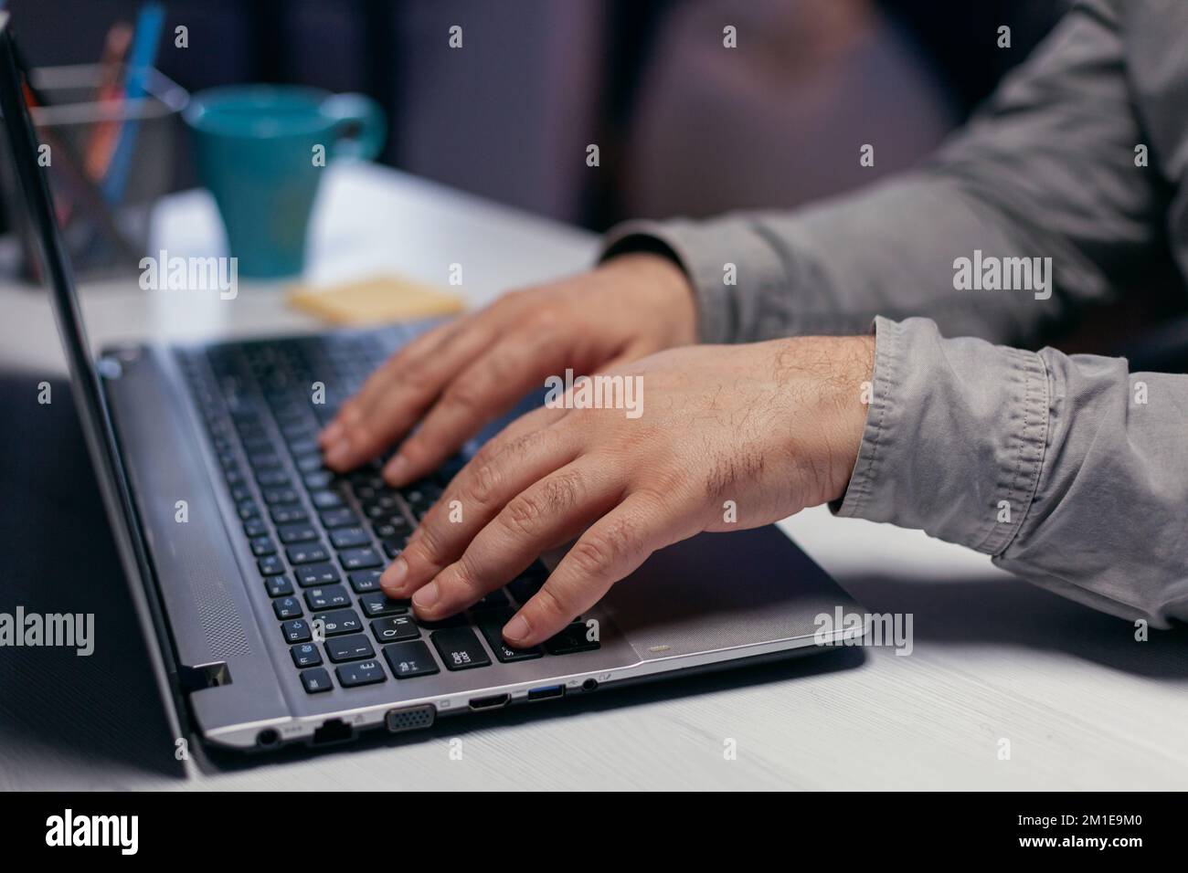 Hands of office manager over keypad in corporate workplace. Close up of ...