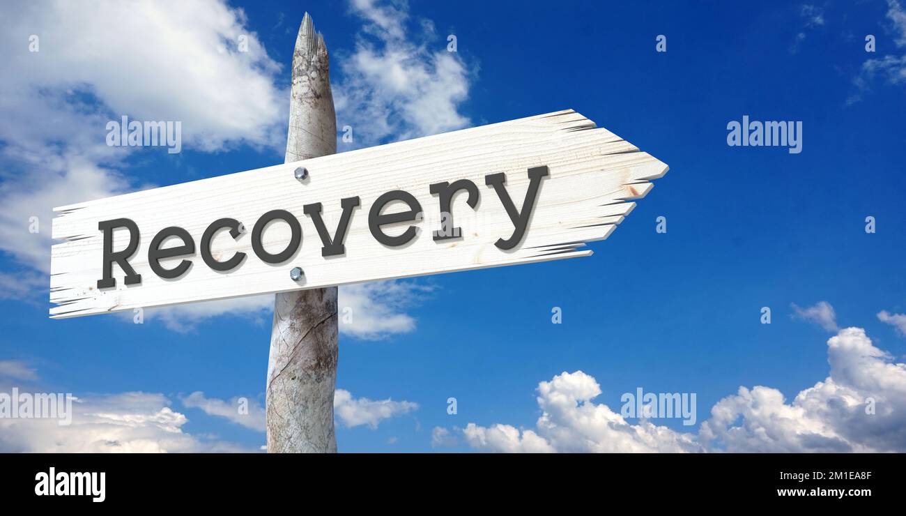 Recovery - wooden signpost with one arrow Stock Photo - Alamy