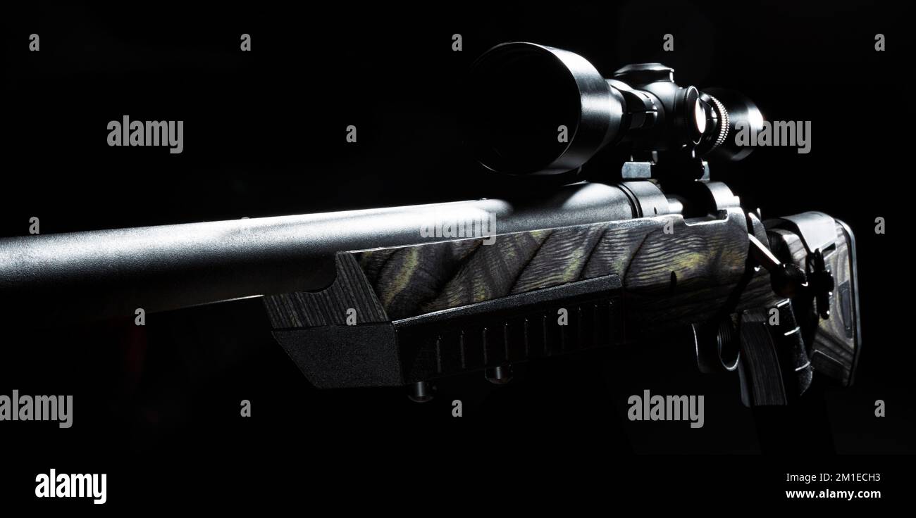 High power scope on a bolt action rifle on black Stock Photo - Alamy