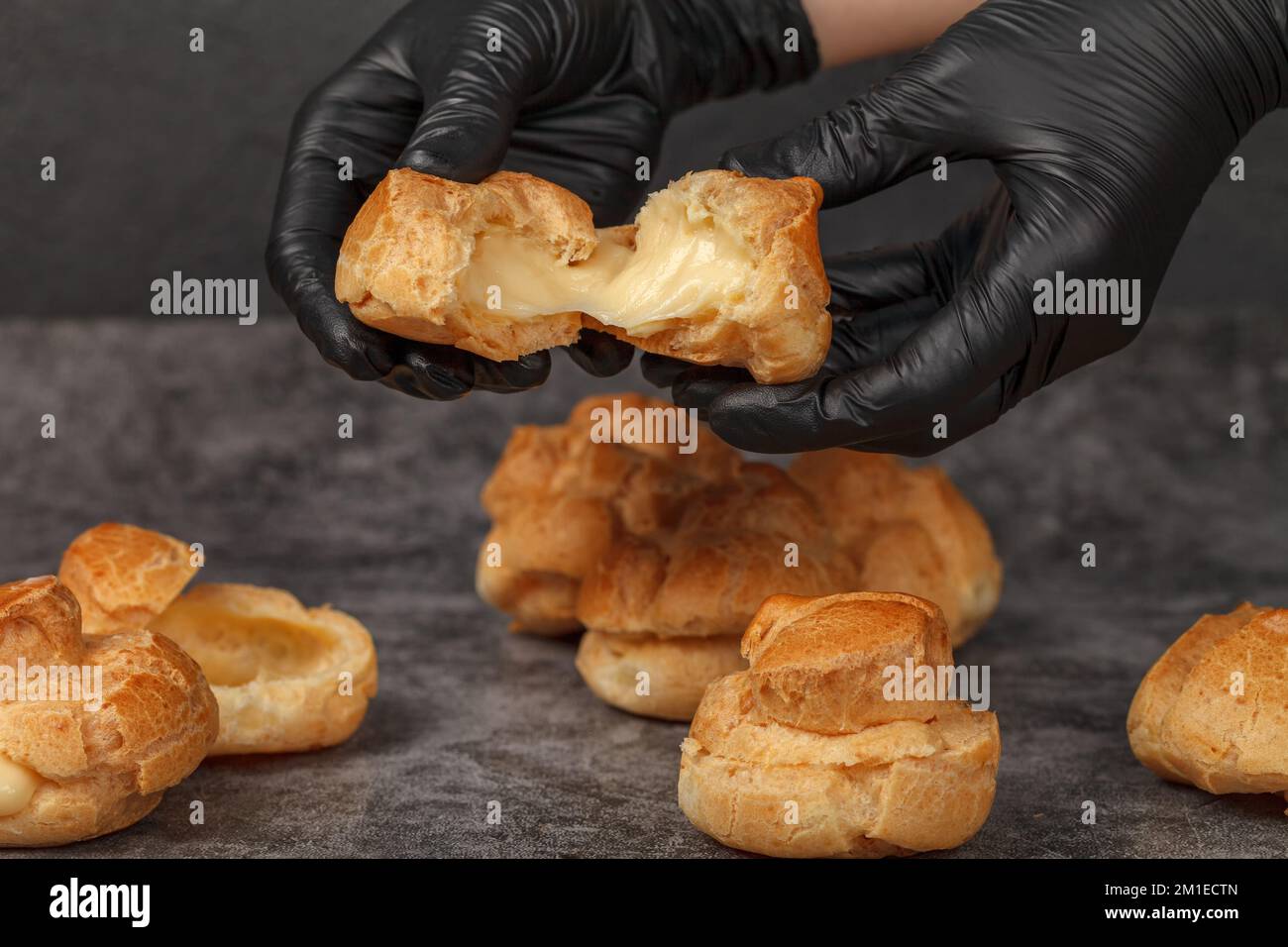 Custard-filled profiteroles ready to serve. Ready-made profiteroles ...