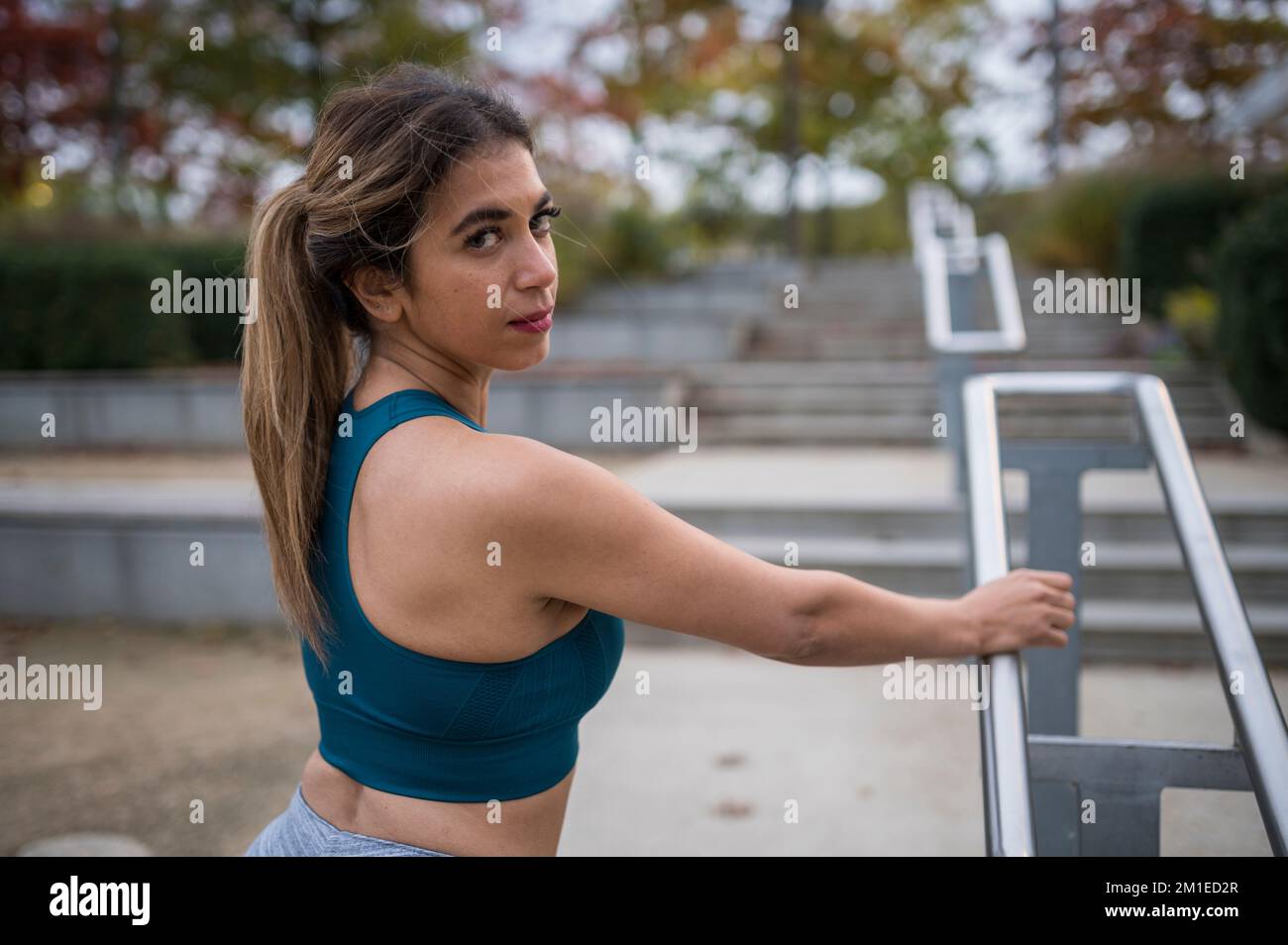 Female runner in Stratford Olympic Park, East London, England, UK Stock ...