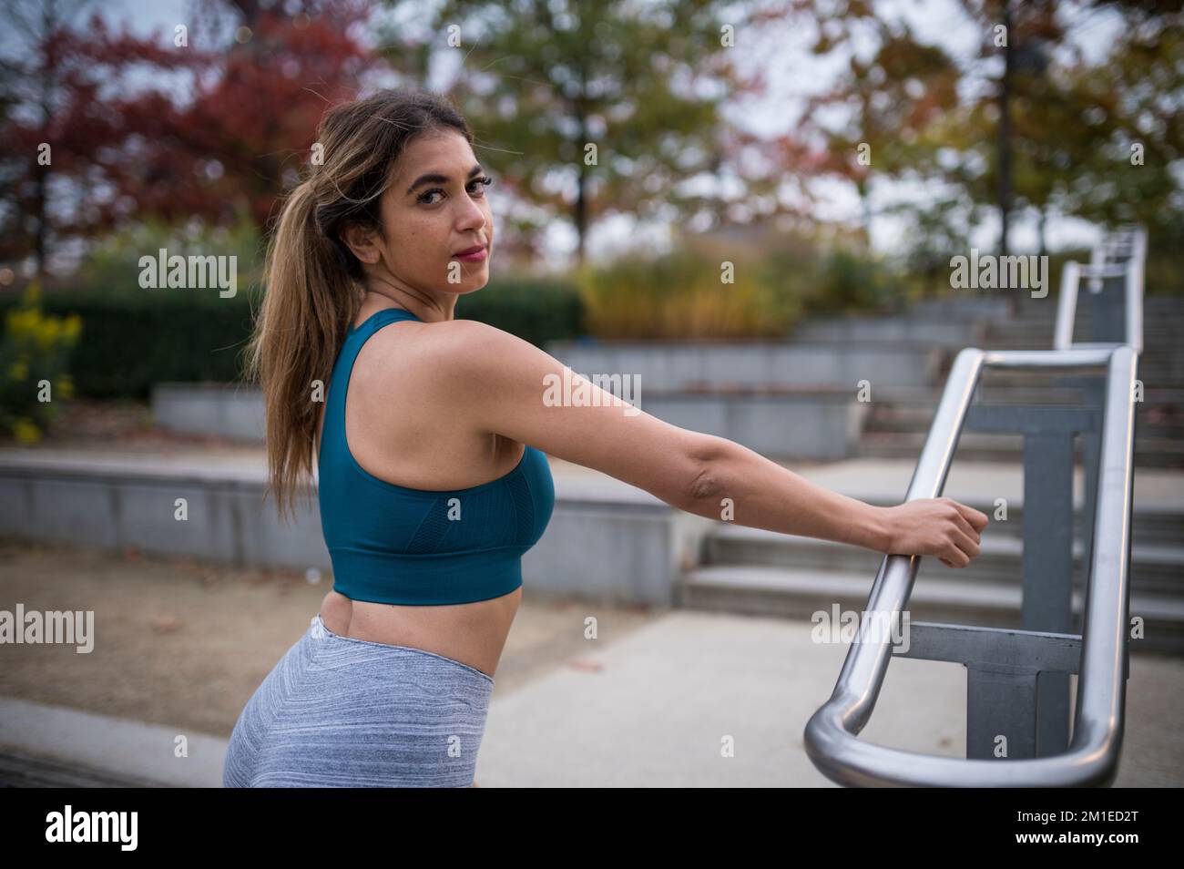 Female runner in Stratford Olympic Park, East London, England, UK Stock ...