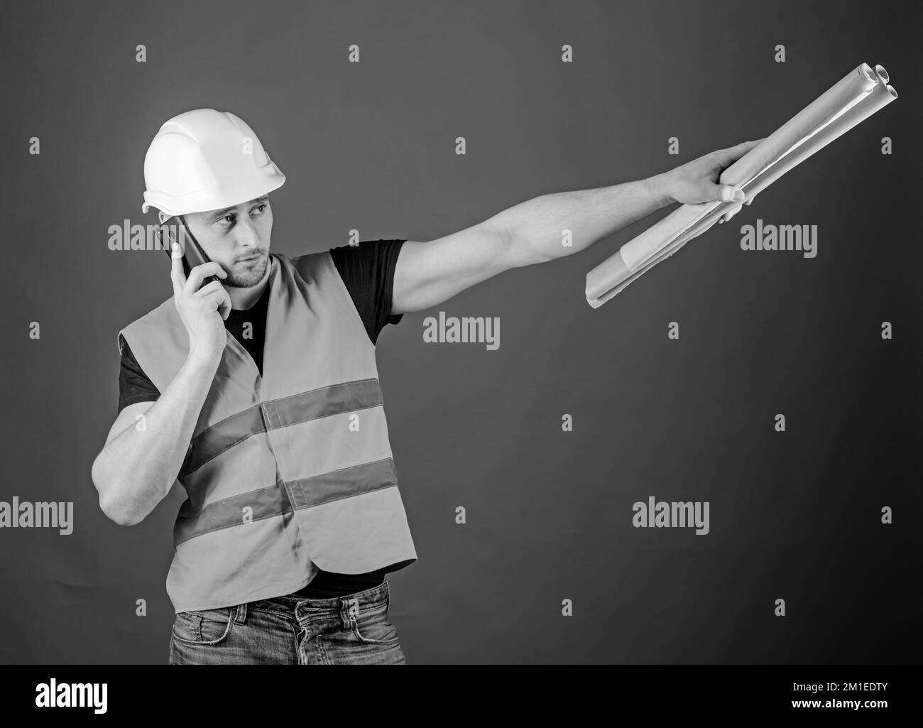 Negotiation concept. Man, architect in helmet supervises construction ...