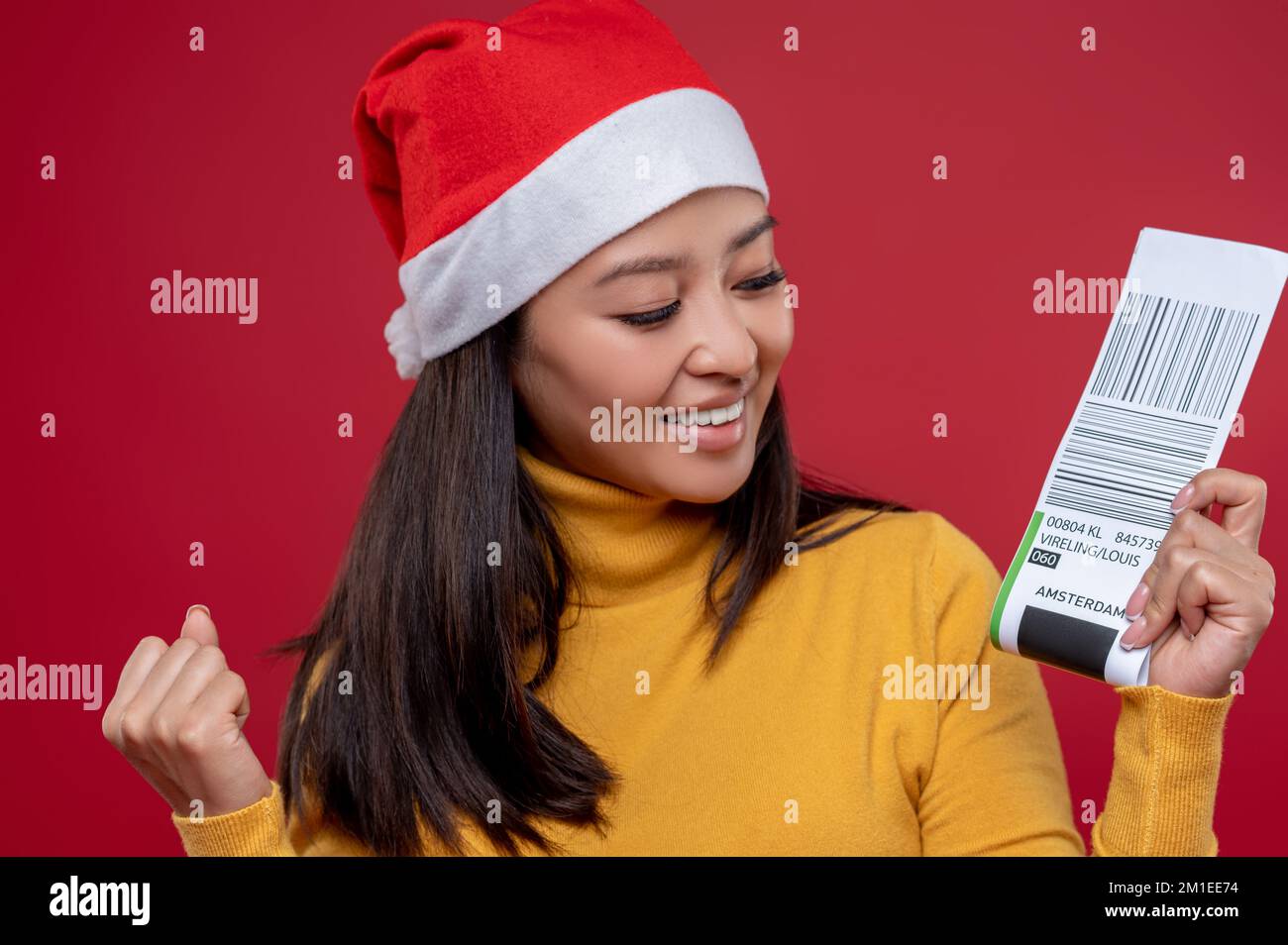 Cute smiling woman holding a barcode in hands Stock Photo - Alamy