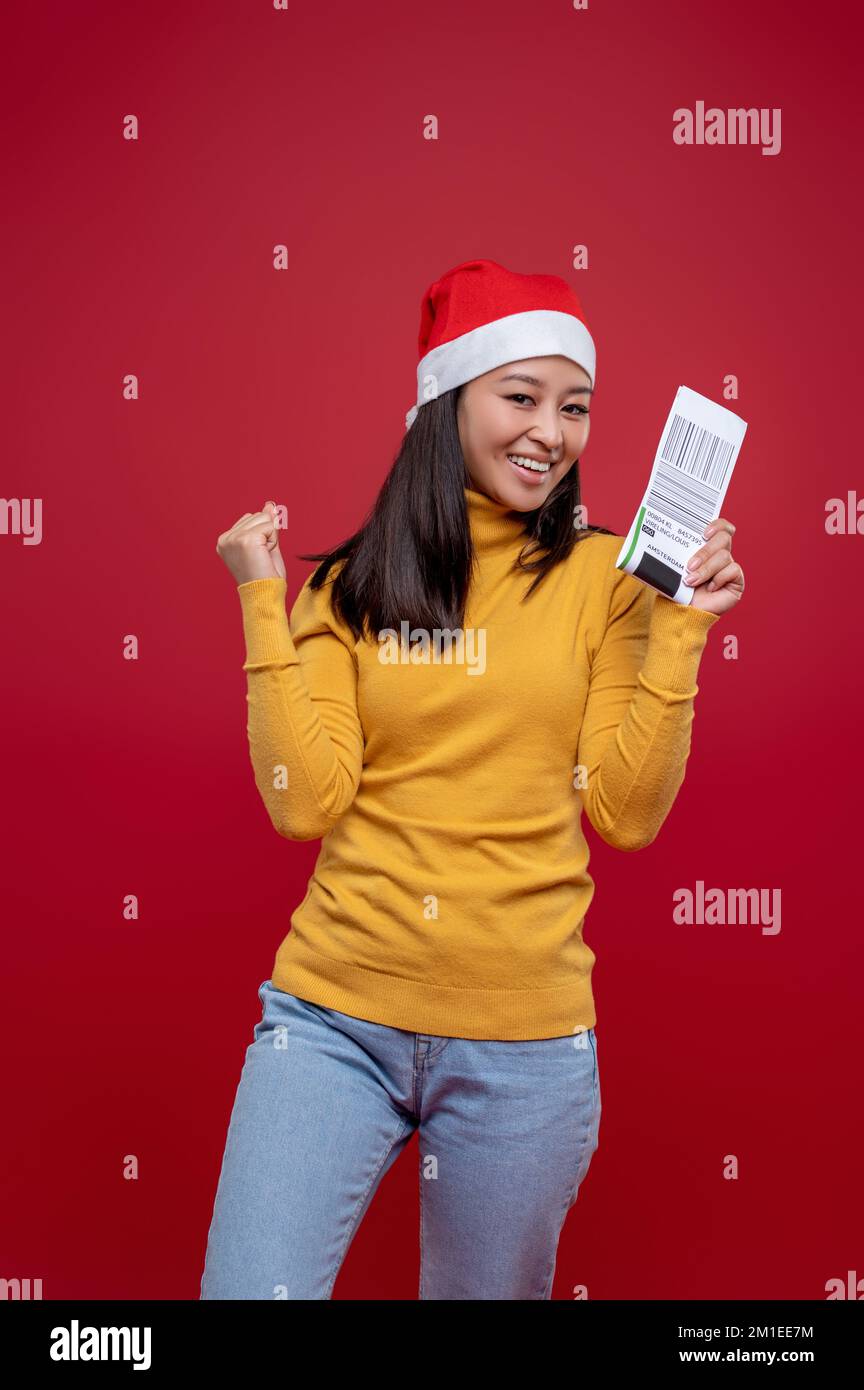 Cute smiling woman holding a barcode in hands Stock Photo - Alamy
