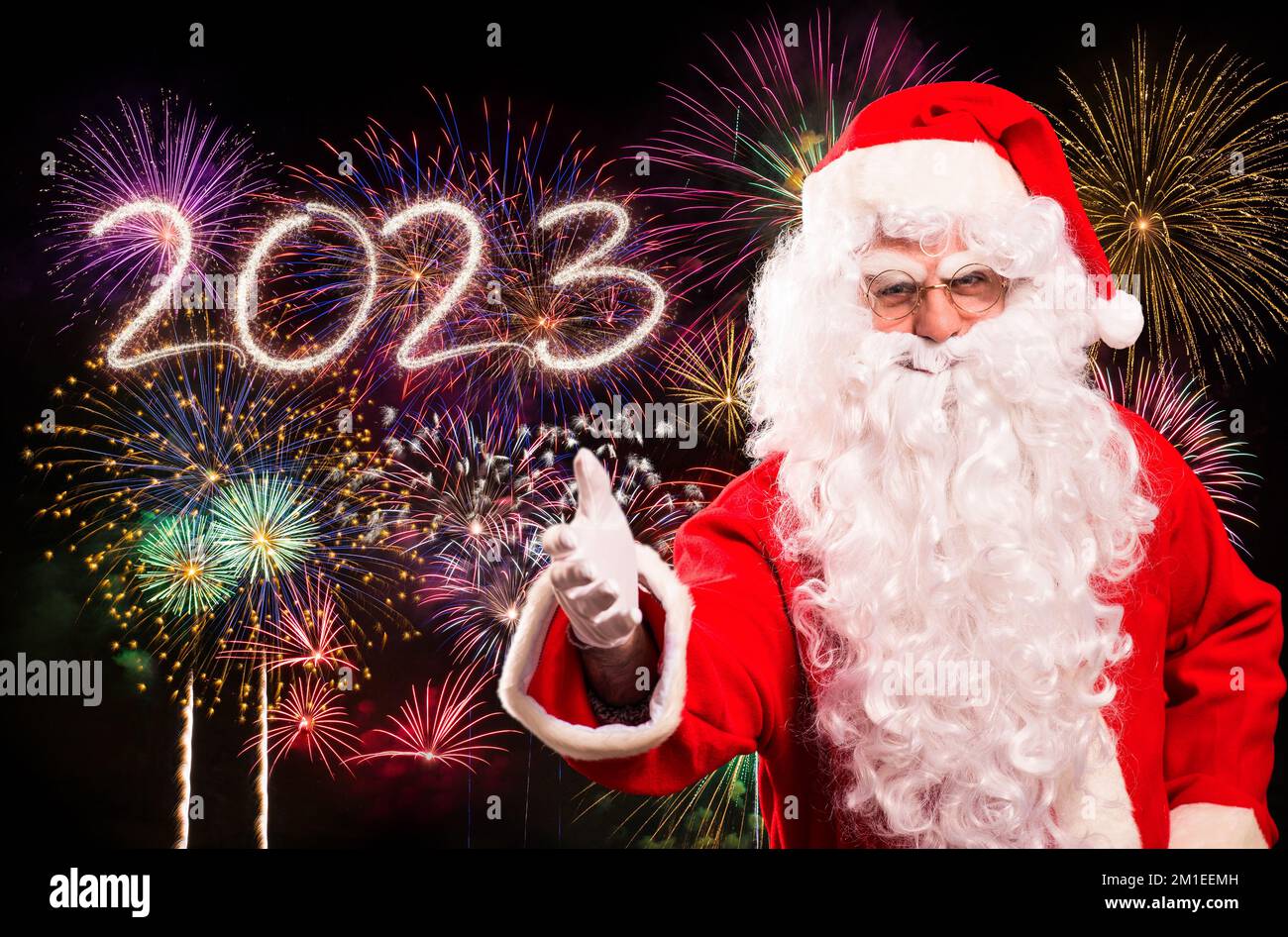 Santa Claus in front of fireworks, Christmas and new year 2023 concepts ...