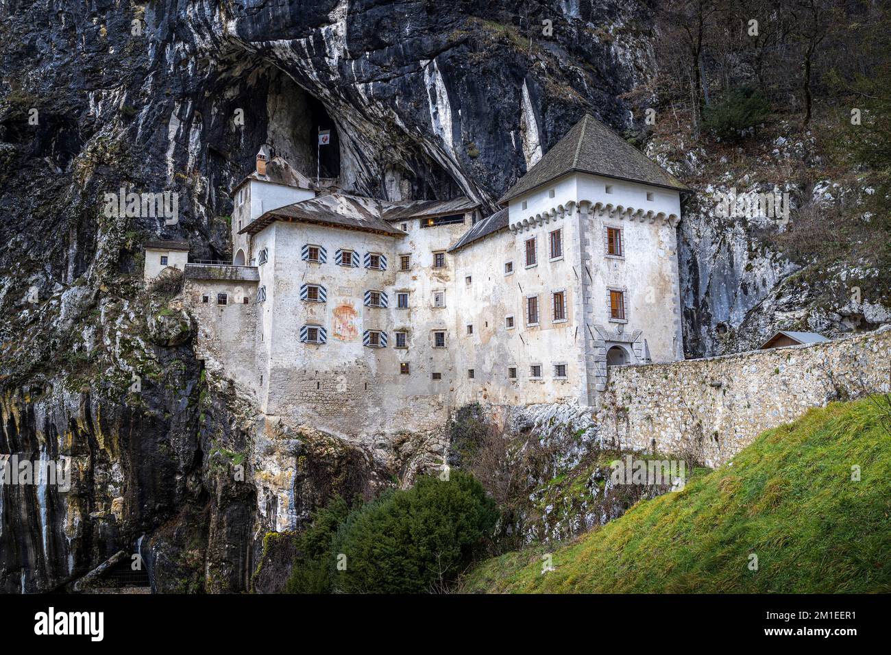 ancient castle of predjama in slovenia Stock Photo - Alamy