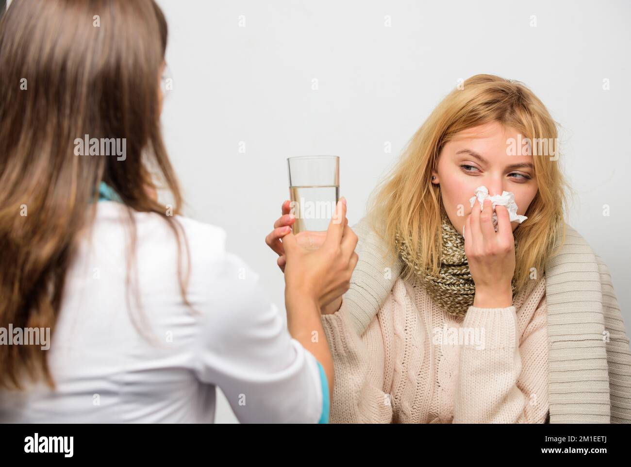 Tips how to get rid of cold. Woman consult with doctor. Girl in scarf ...