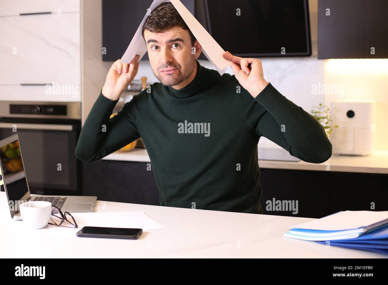 Young man stressed in home hi-res stock photography and images - Alamy