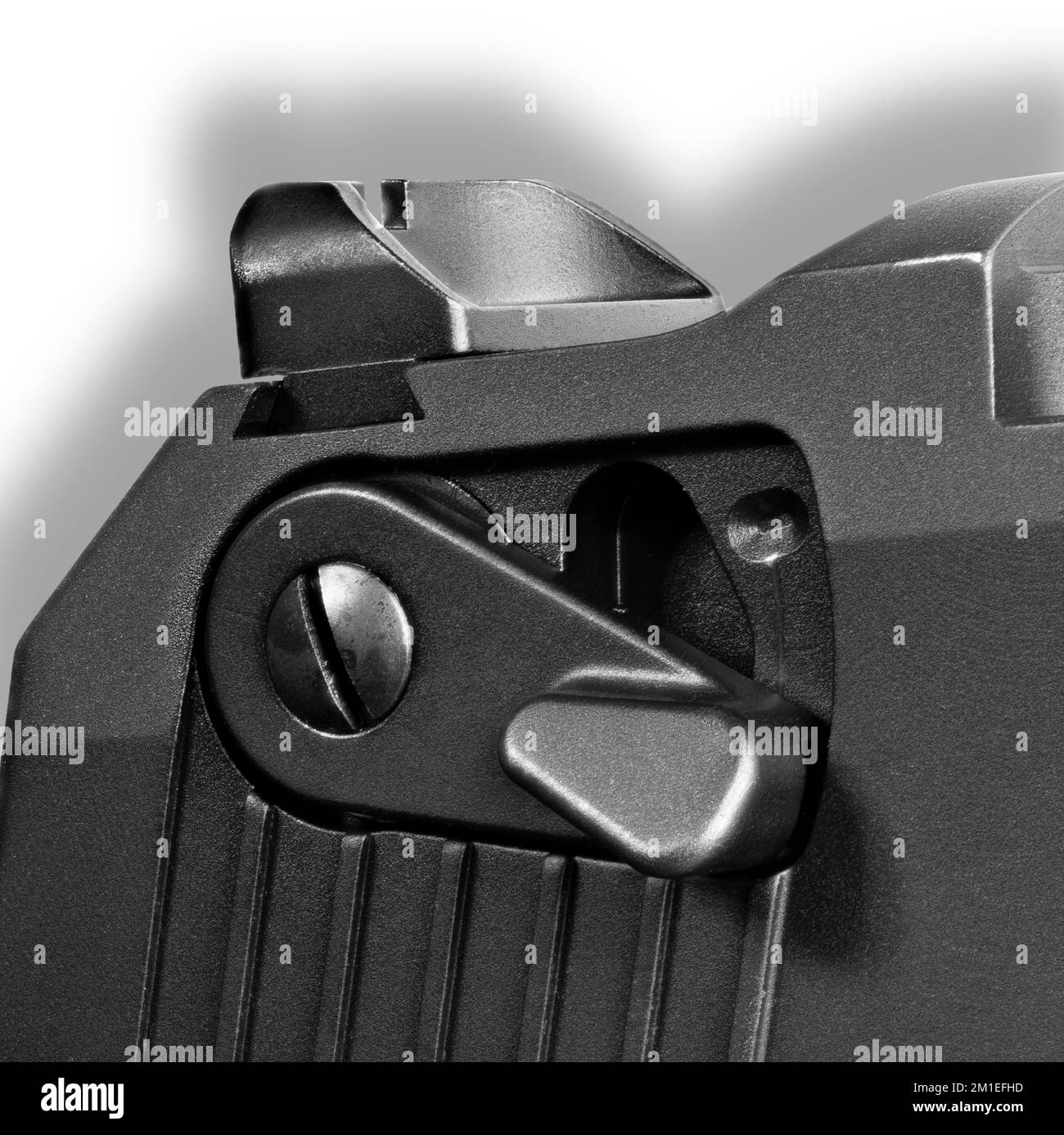 Rear sight and safety on a handgun with shadow behind Stock Photo - Alamy