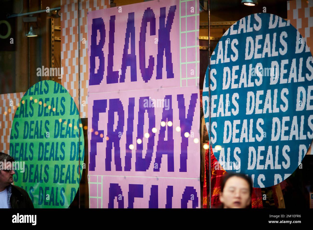 Manchester city centre Market street Black Friday signs in shop window ...