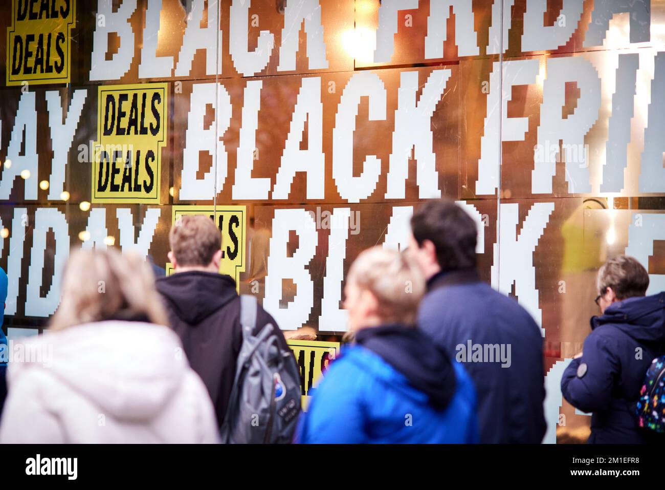 Manchester city centre Market street Black Friday signs in shop window ...