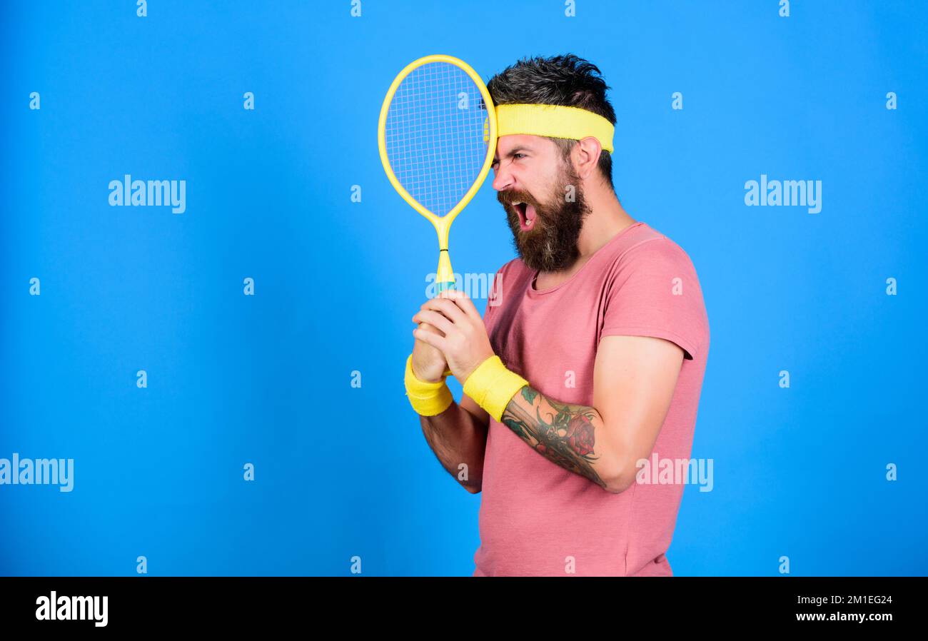 Tennis sport and entertainment. Athlete hold tennis racket in hand on ...