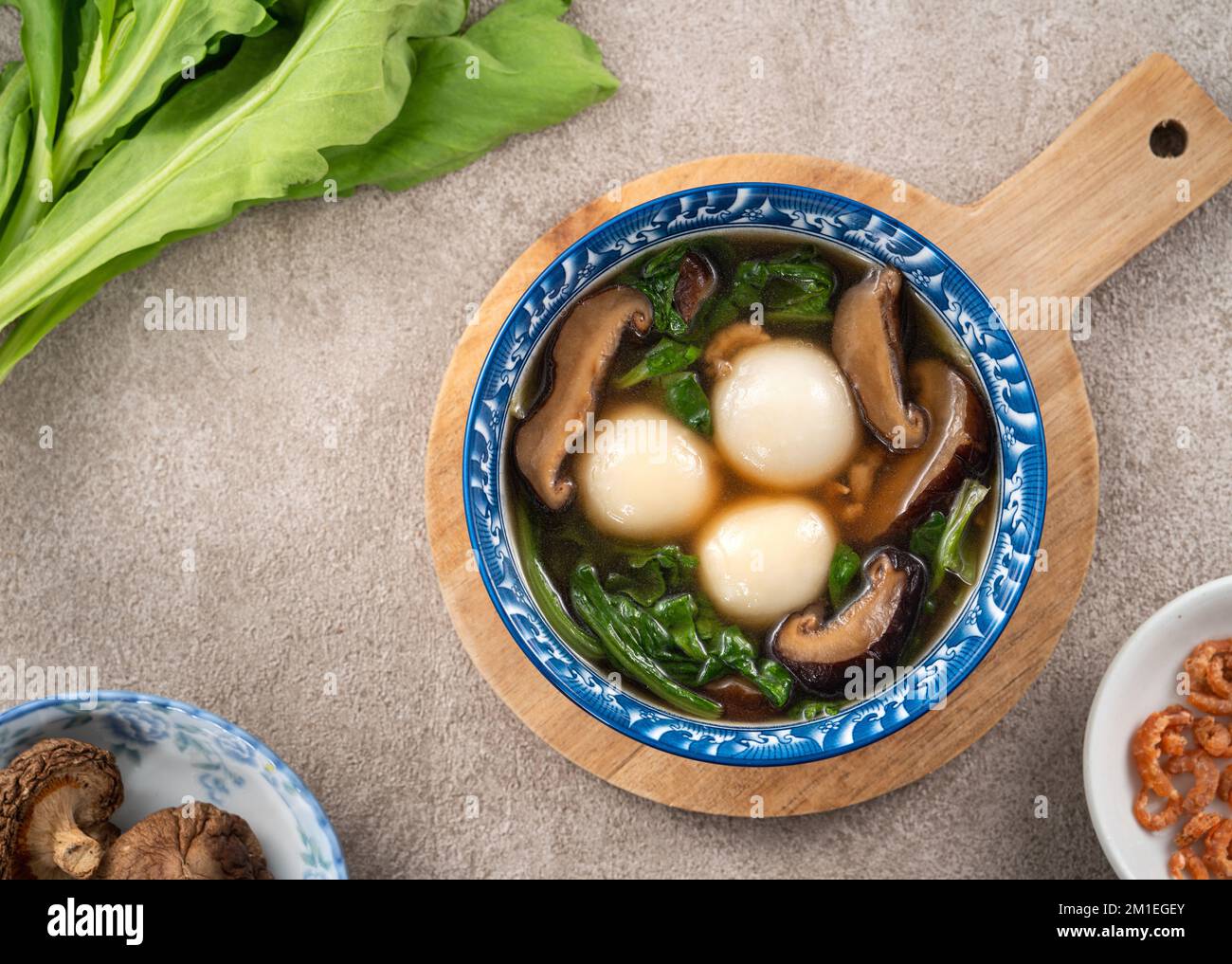 Eating big tangyuan yuanxiao (tang yuan, glutinous rice dumpling balls ...
