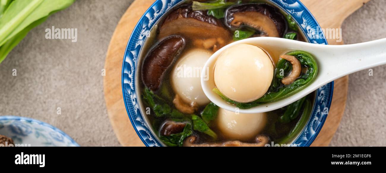 Eating big tangyuan yuanxiao (tang yuan, glutinous rice dumpling balls ...