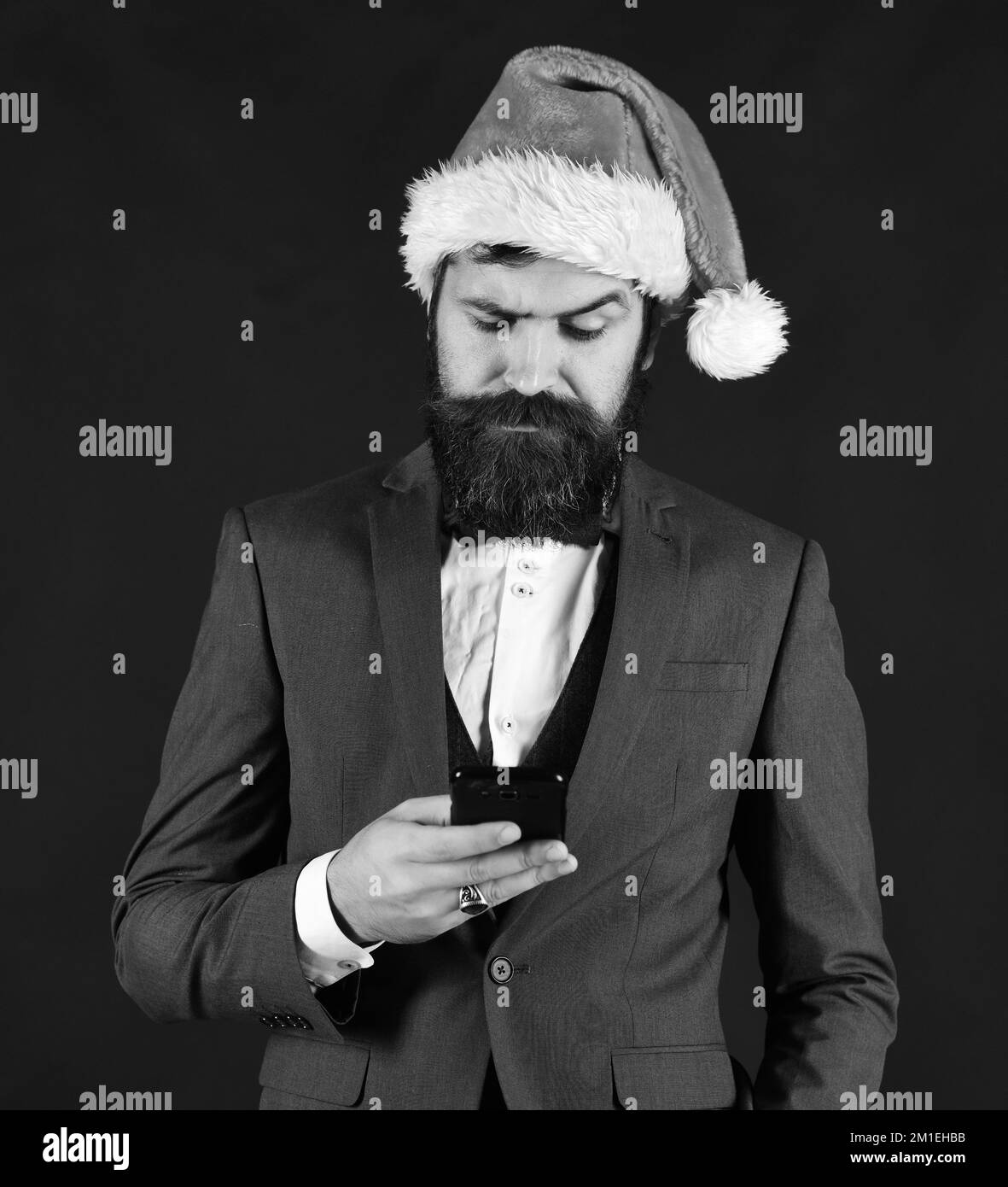 Man in suit phone serious Black and White Stock Photos & Images - Alamy