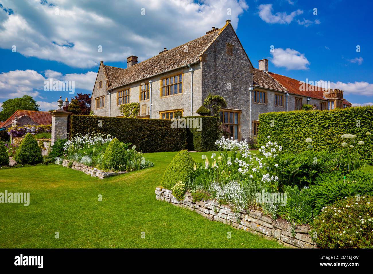 A small white garden and the west front of Lytes Cary Manor, nr ...