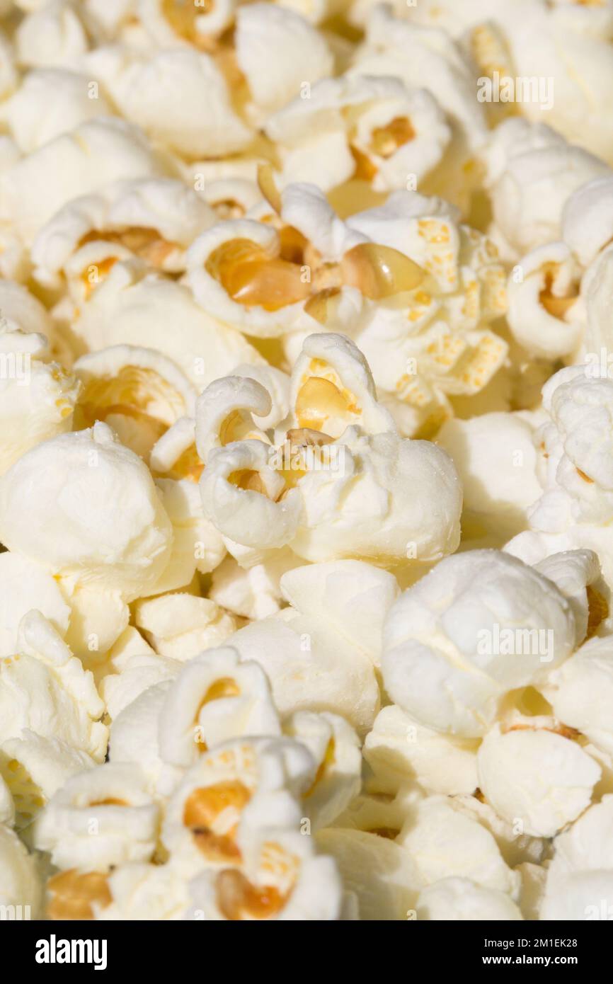 Scattered popcorn texture background, close up shot Stock Photo - Alamy