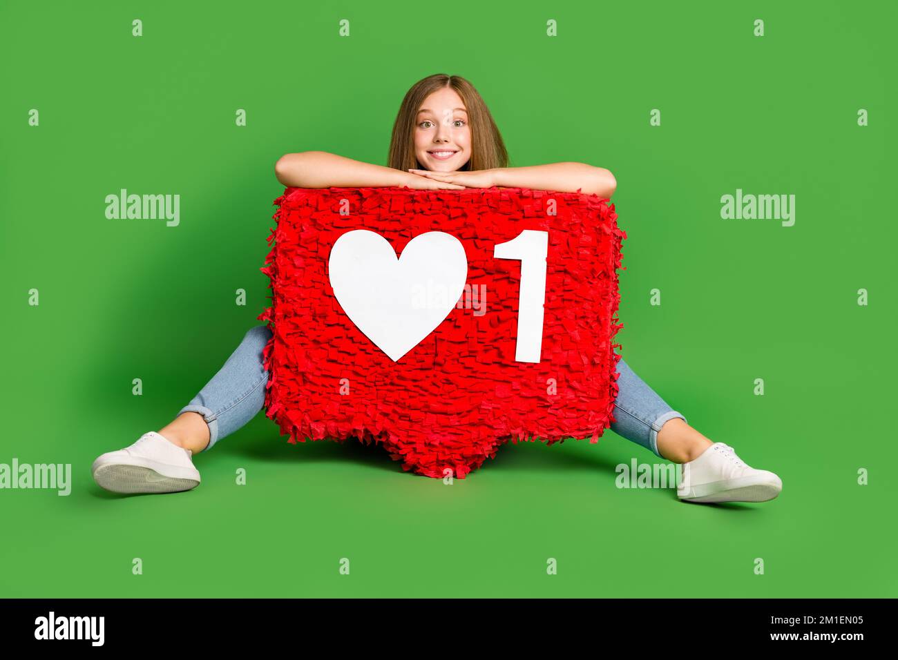 Full body portrait of excited positive person sit floor behind huge ...