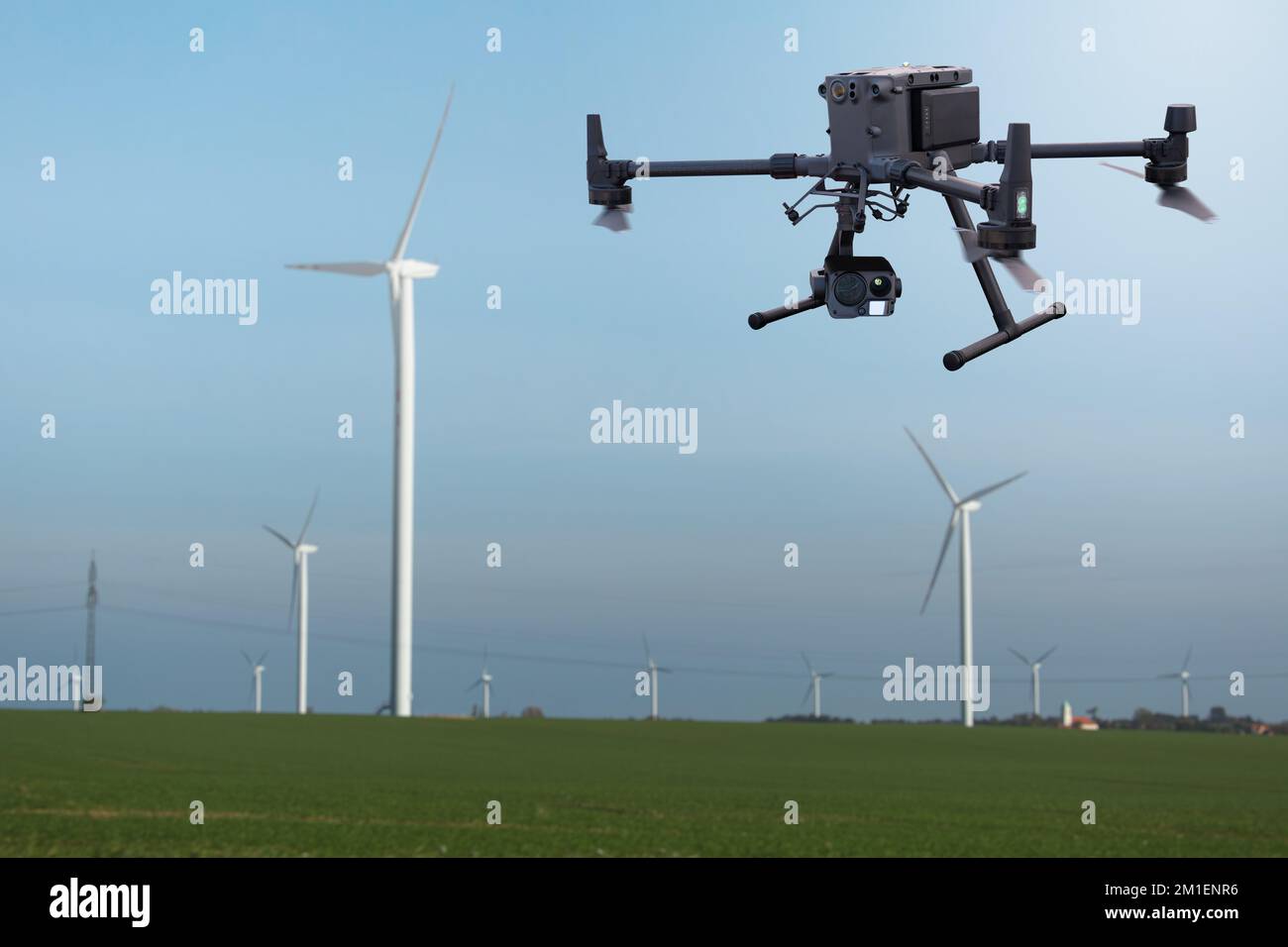 Industrial drone inspects wind turbines Stock Photo - Alamy