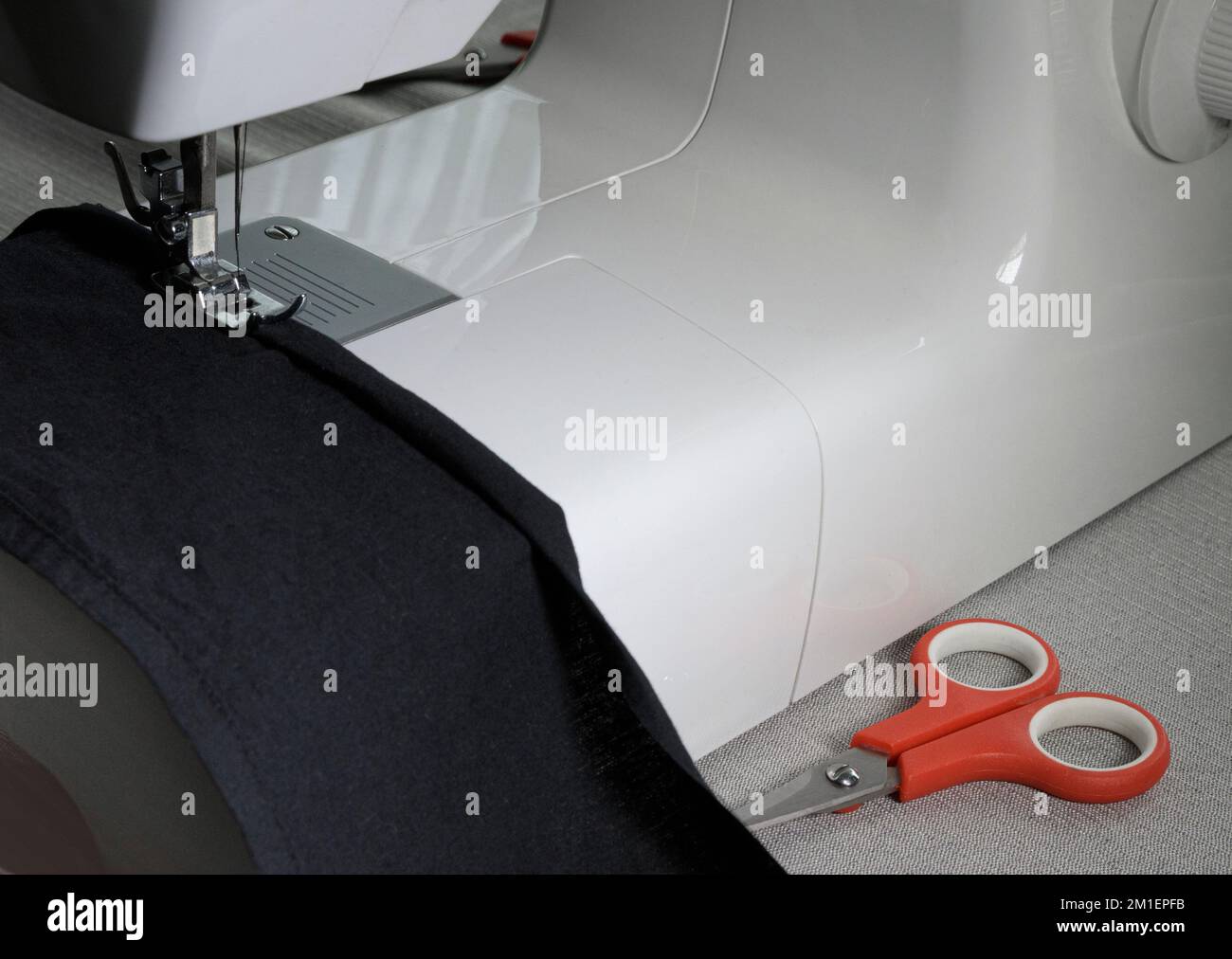 Work process on sewing machine hi-res stock photography and images - Alamy