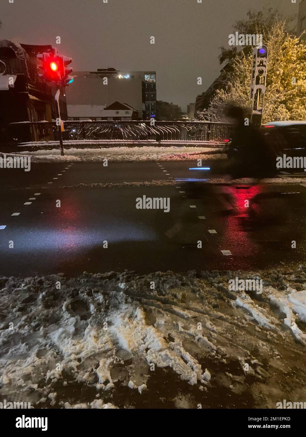 Commuter on icy pavement hi-res stock photography and images - Alamy