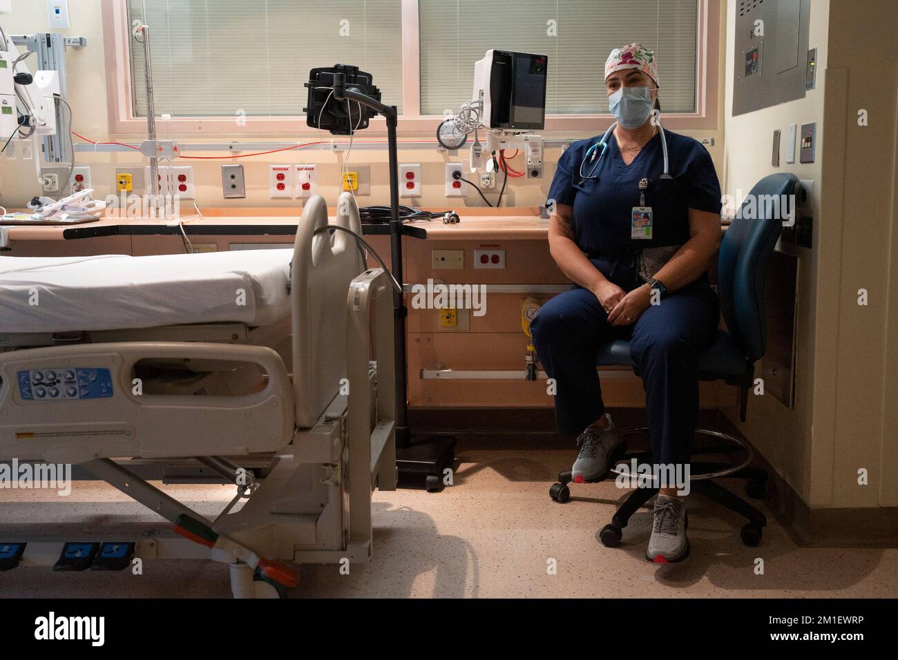 Registered nurse Merit Hayden-Town is shown in the intensive care unit ...