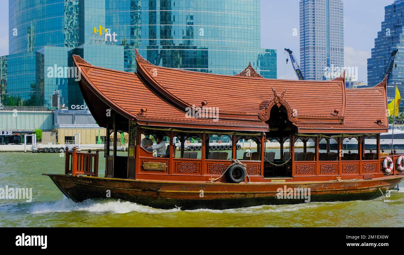 A traditional Thai-designed hotel ferry in Chaophraya River, Bangkok ...