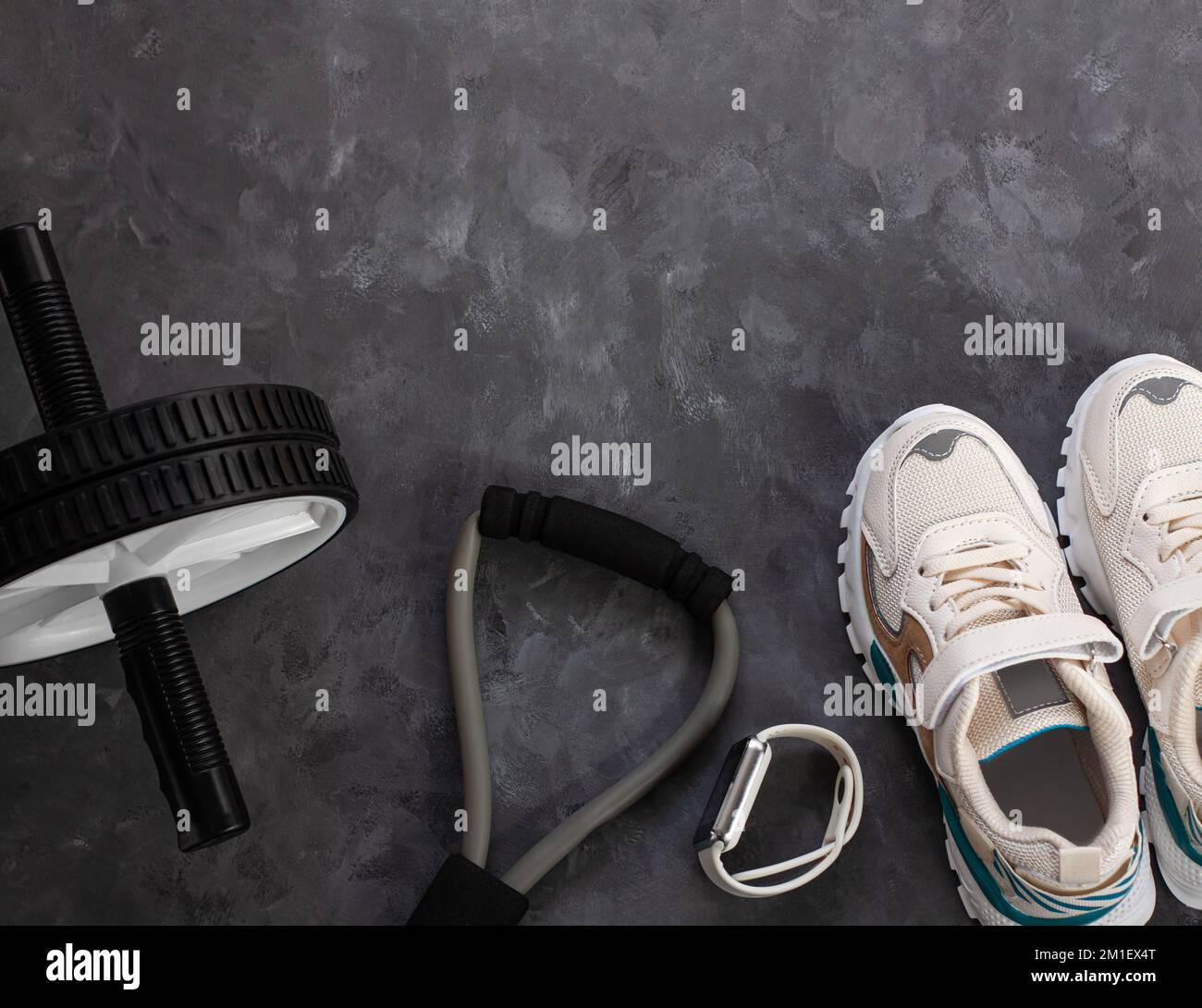 Sport equipment flatlay composition, white sneakers,sports watch ...