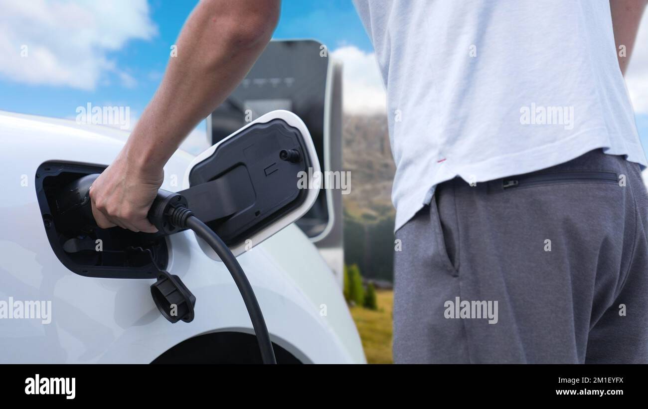 Installing electric vehicle charger hi-res stock photography and images ...