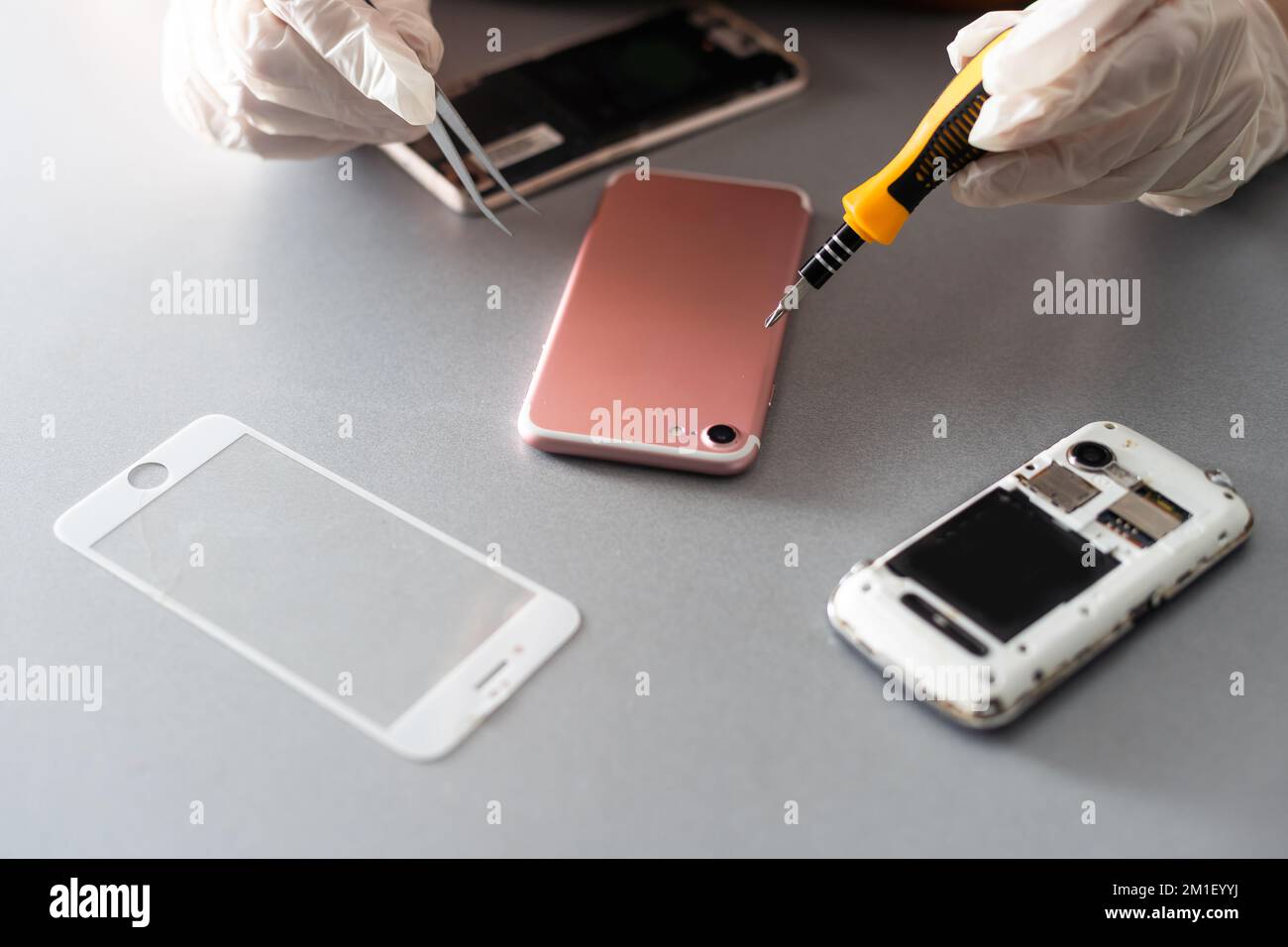 Close-up photos showing process of mobile phone repair Stock Photo - Alamy
