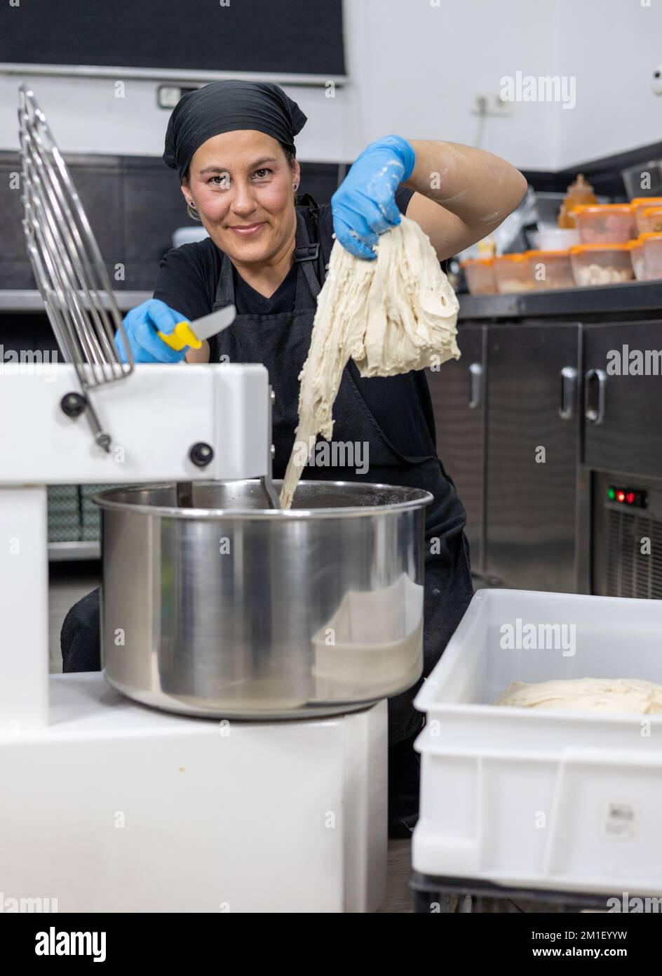 Woman mixing dough in hi-res stock photography and images - Alamy