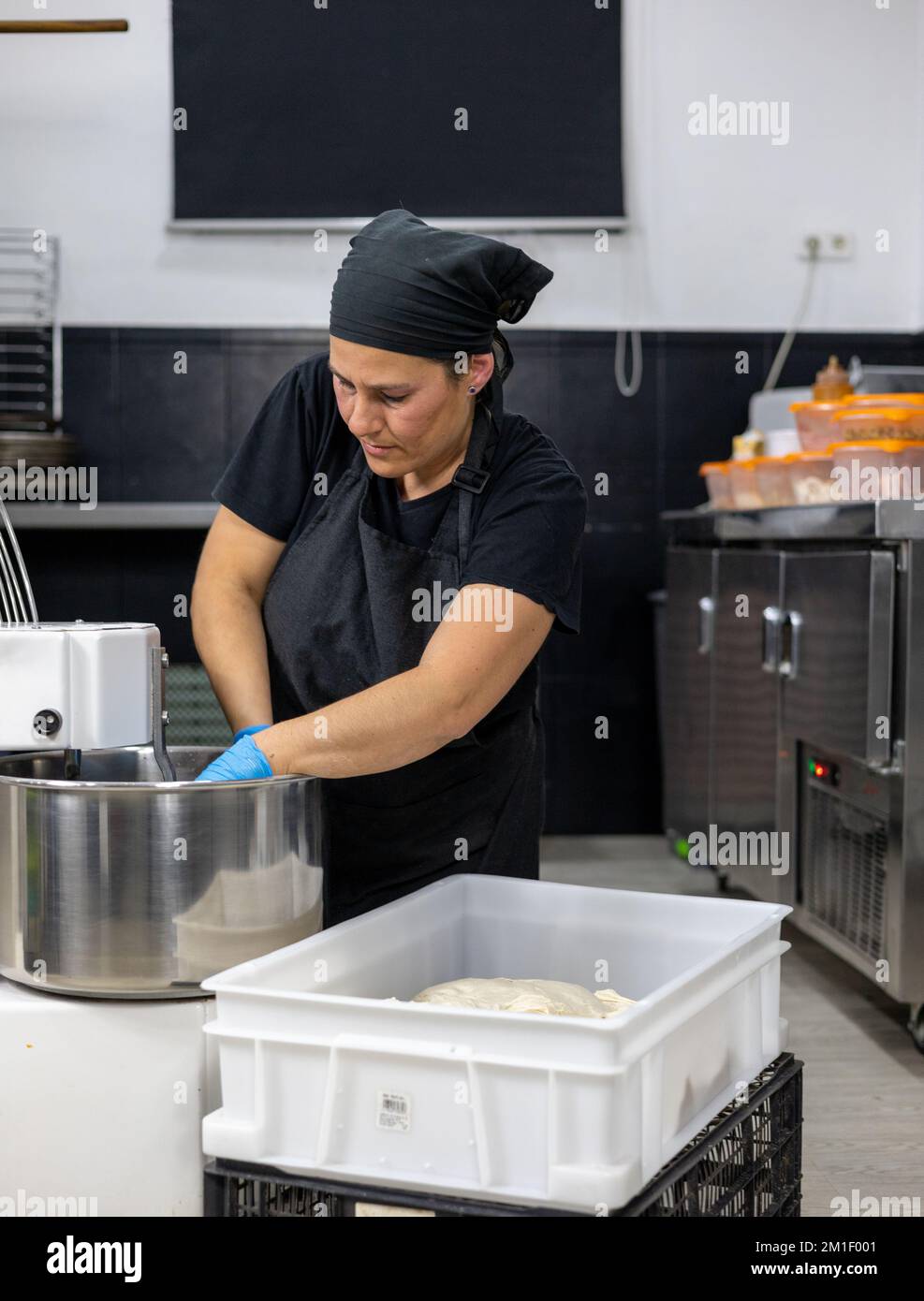 Woman mixing dough in hi-res stock photography and images - Alamy