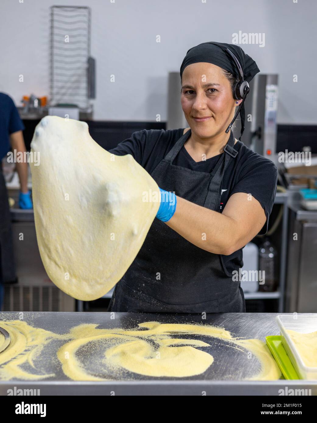 Chef rolling pizza dough hi-res stock photography and images - Alamy