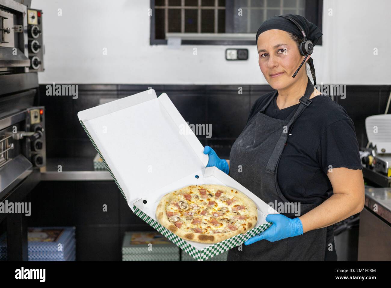 Woman pizza box hi-res stock photography and images - Alamy