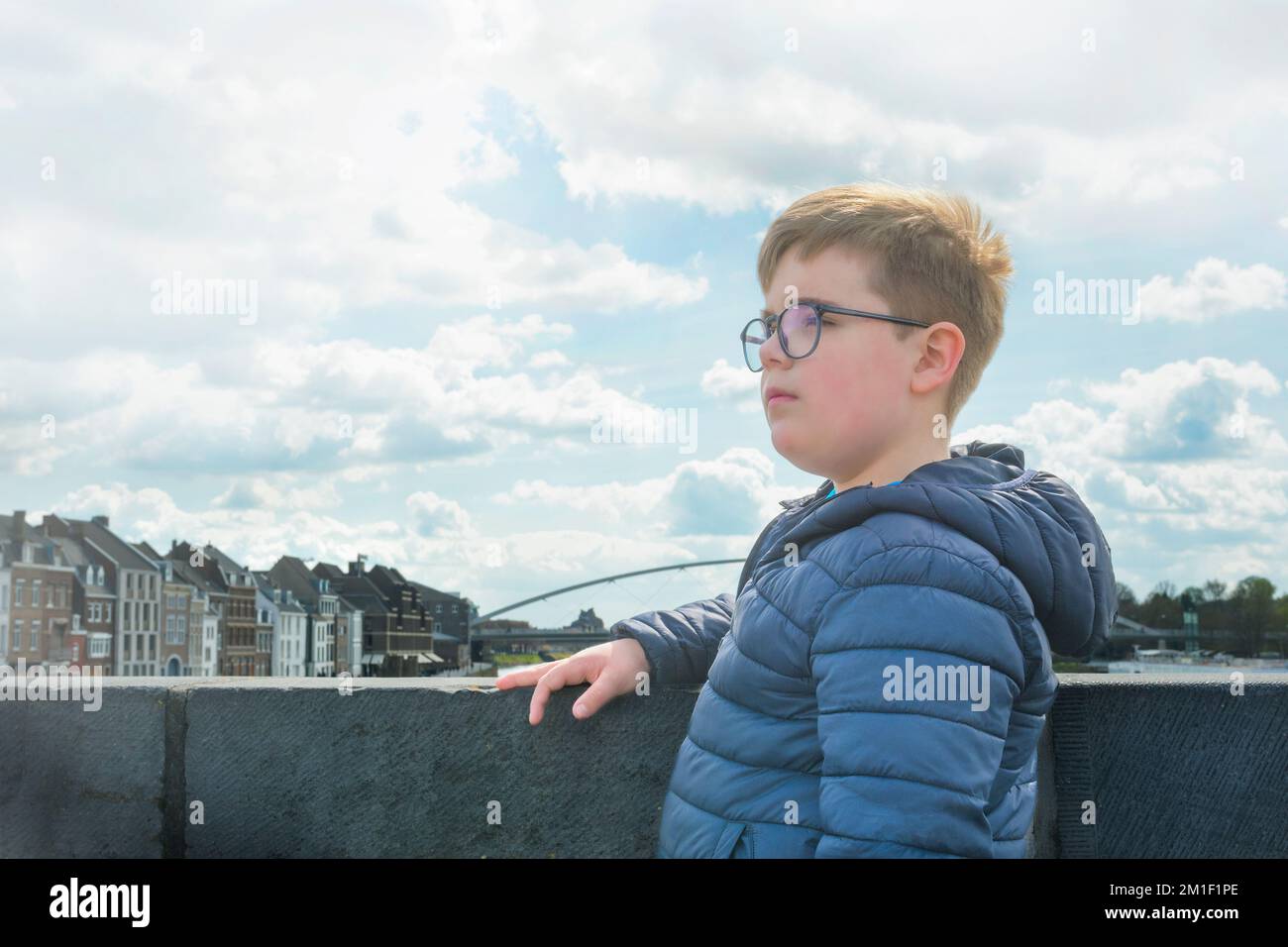 portrait of a modern boy. pensive boy on a walk through the ancient ...