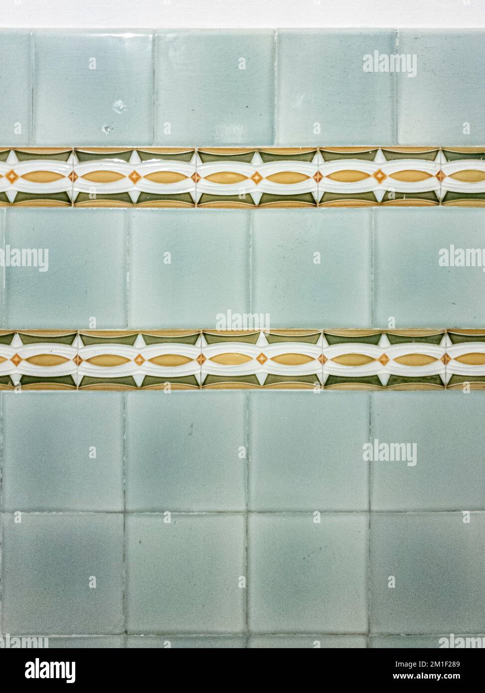 A vertical closeup top view of the wall tiles with a beautiful pattern ...