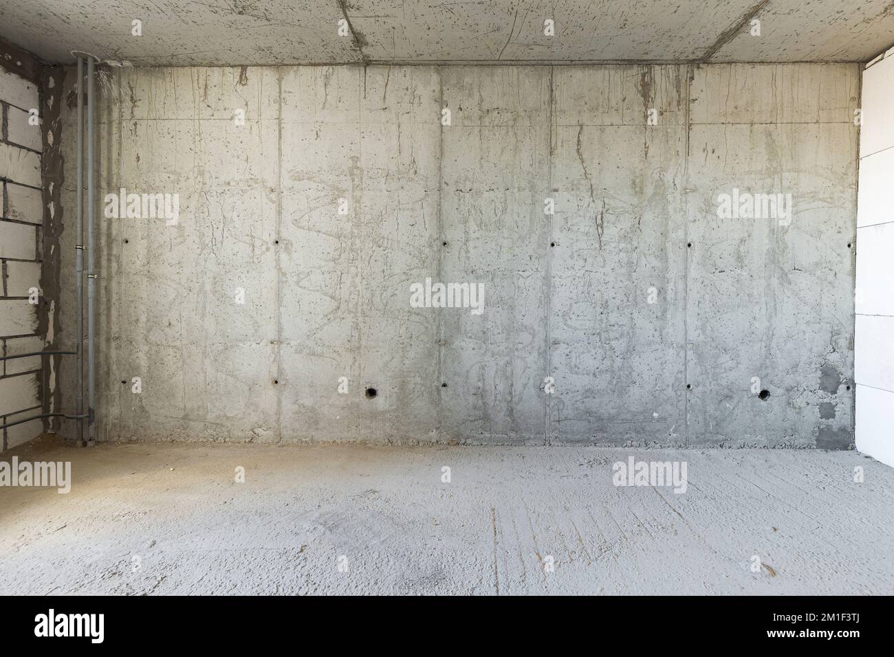 Empty concrete commercial space without finishing with partitions Stock ...