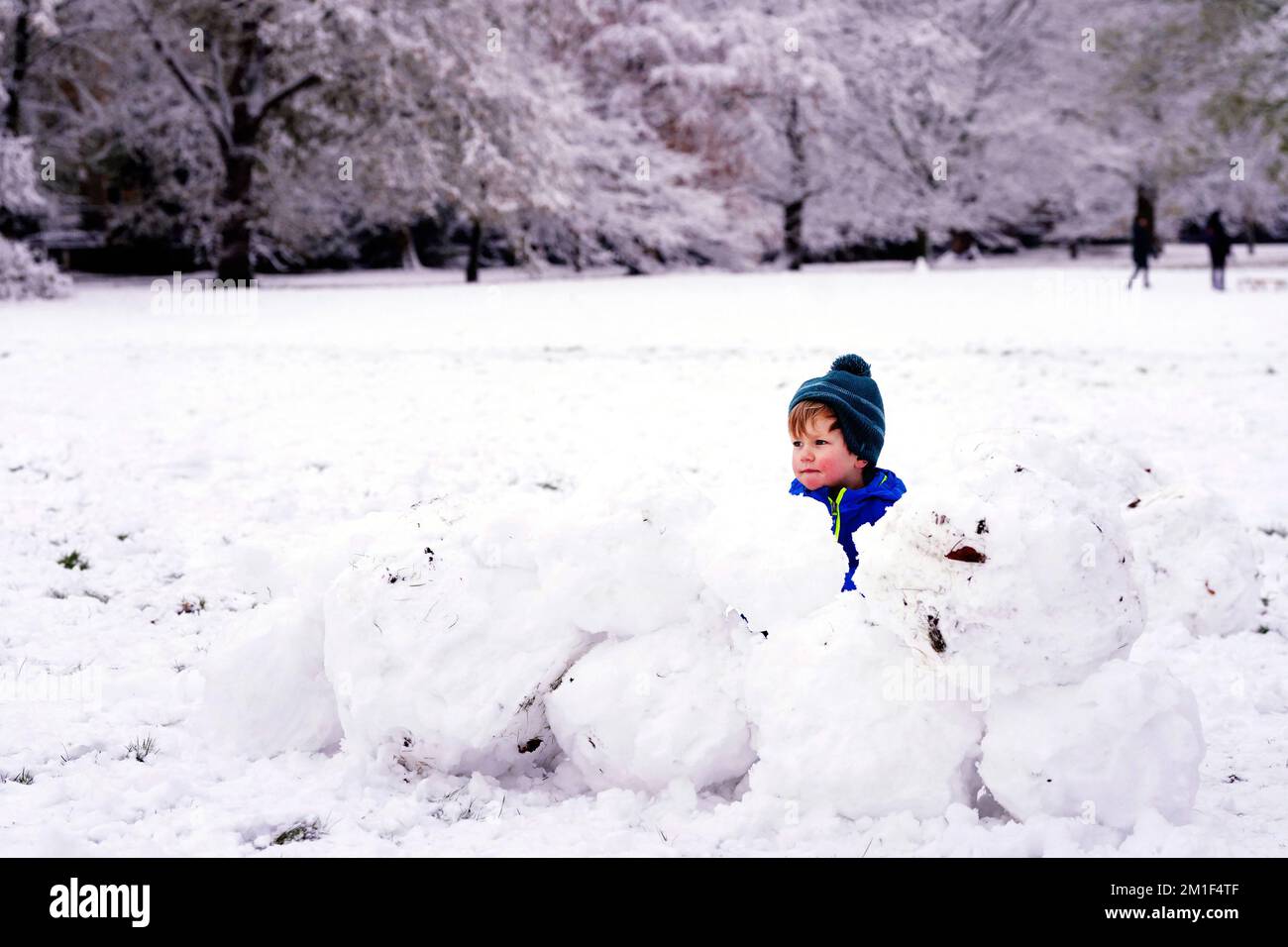 Ziggy Wasilewicz sits behind a pile of giant snowballs in Greenwich ...