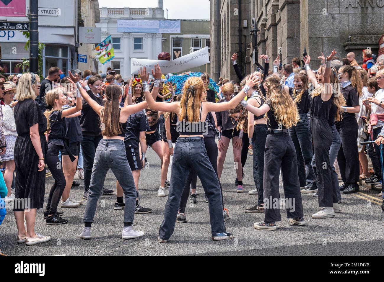 School students performing a dance in the Mazey Day parade celebrations ...